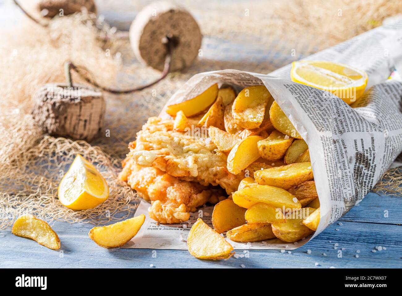 Fish chips served in newspaper hi-res stock photography and images - Alamy