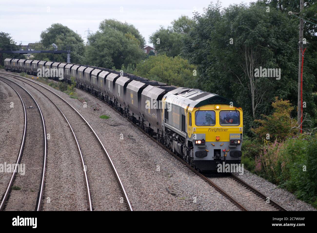 66504 heads west at Magor with a loaded M.G.R Stock Photo - Alamy