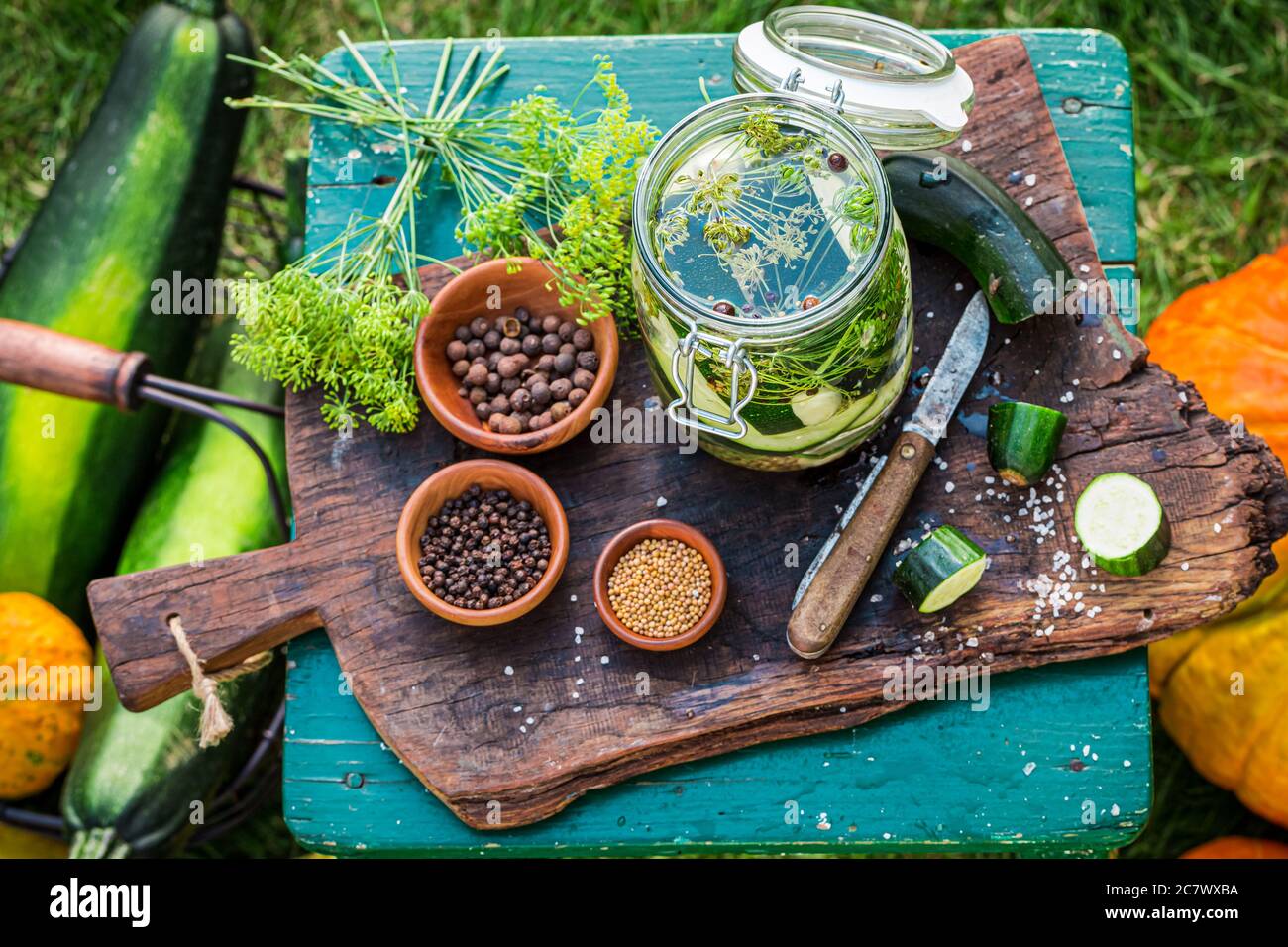 Top view of pickled courgettes with allspice and charlock Stock Photo ...