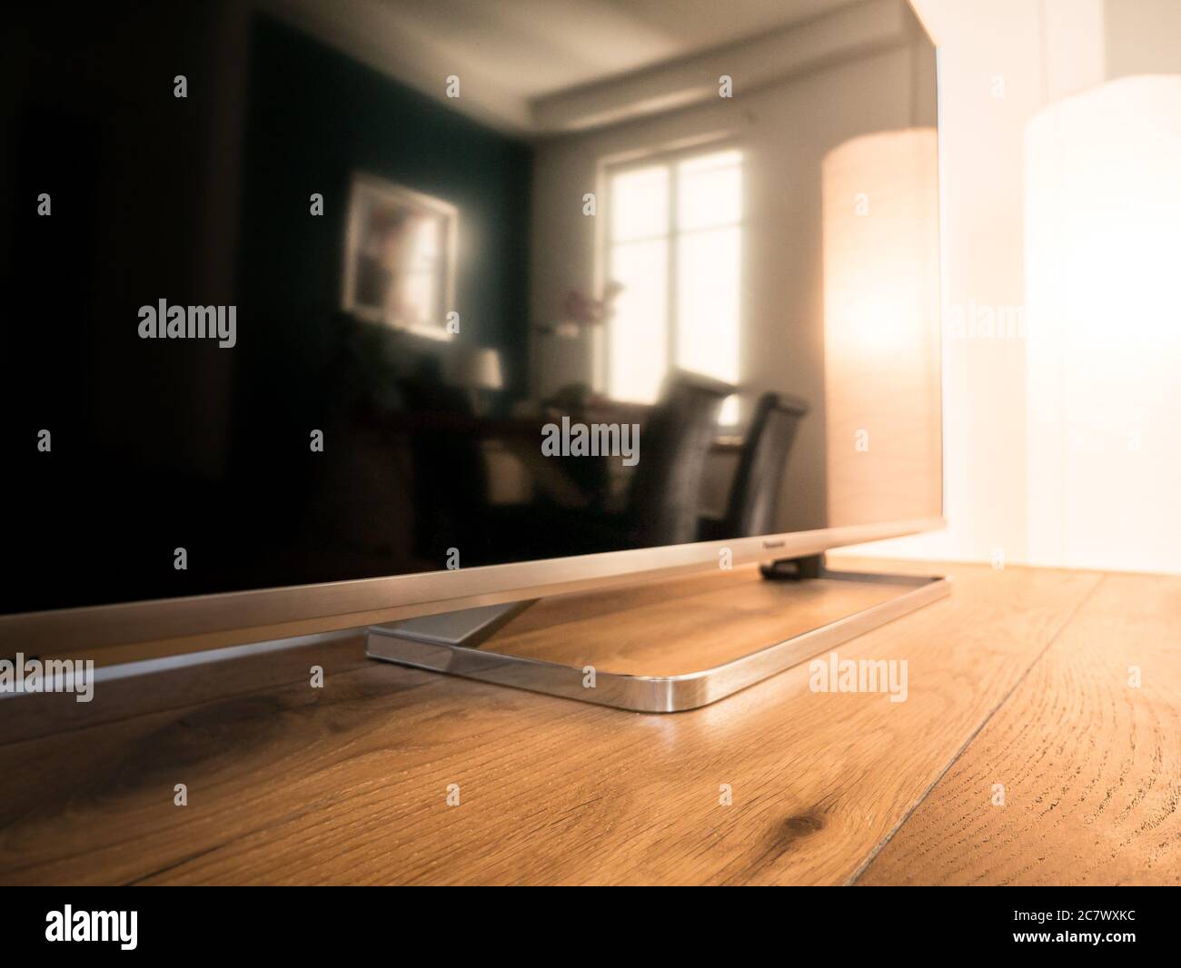 Interior of the living room reflected on the TV screen Stock Photo - Alamy