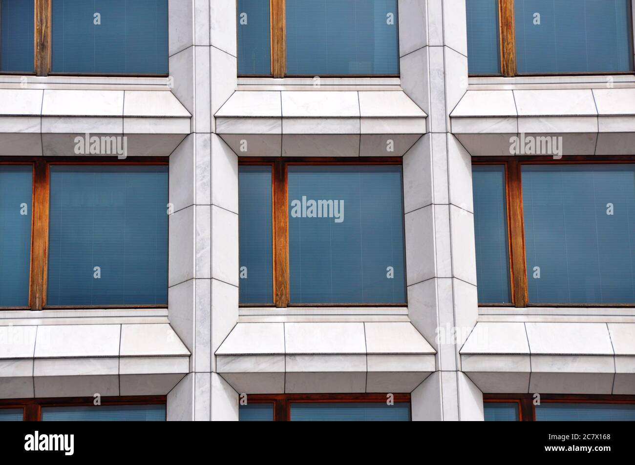 Tall office building with a lot of windows - great for background or ...