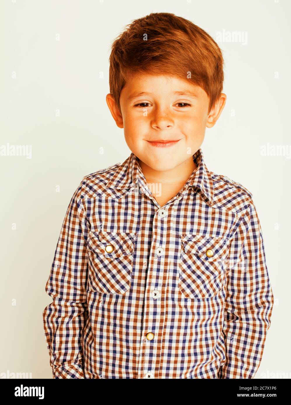 little cute real boy on white background gesture smiling close up ...