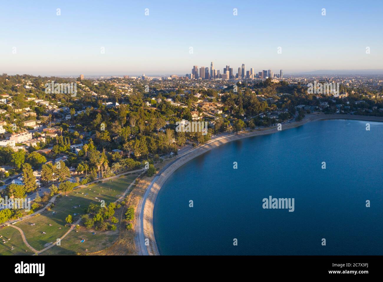 Aerial view of Silver Lake Reservoir with downtown Los Angeles skyline ...