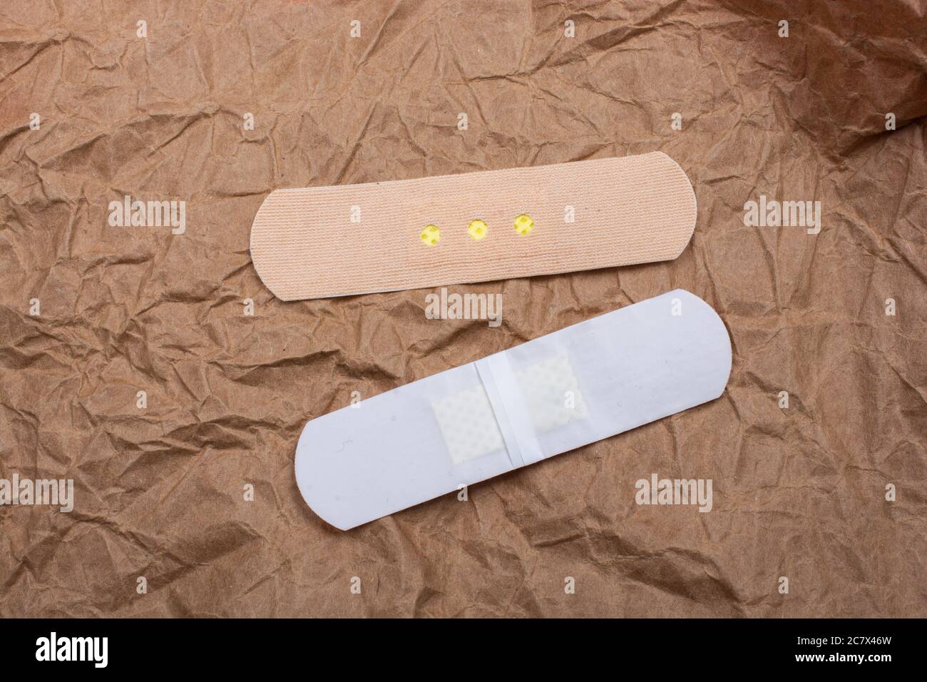 Dressing plasters, wound cross plastering band Stock Photo - Alamy