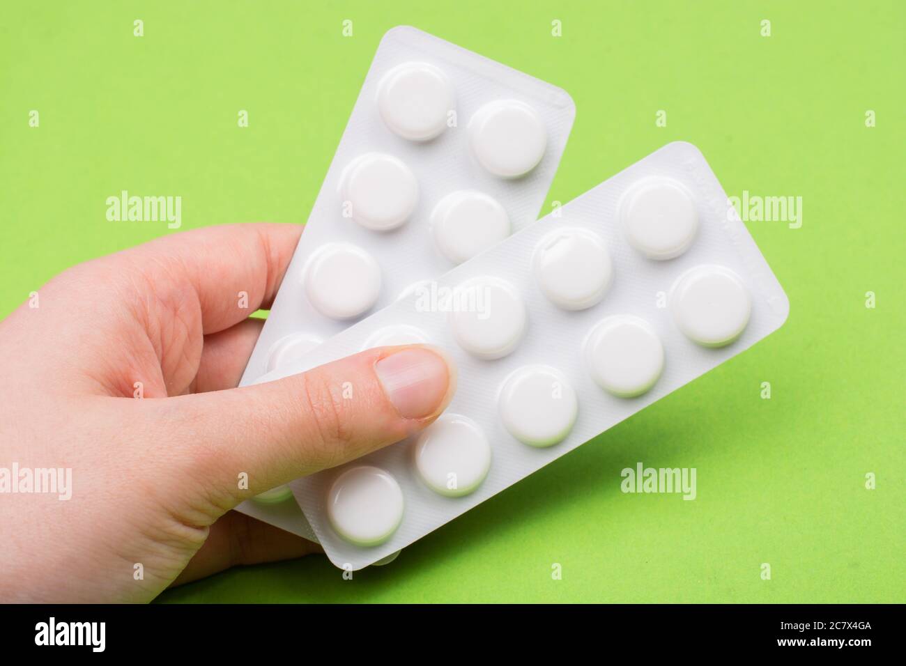 White pill and glass bottle container. Pharmaceutical industry ...