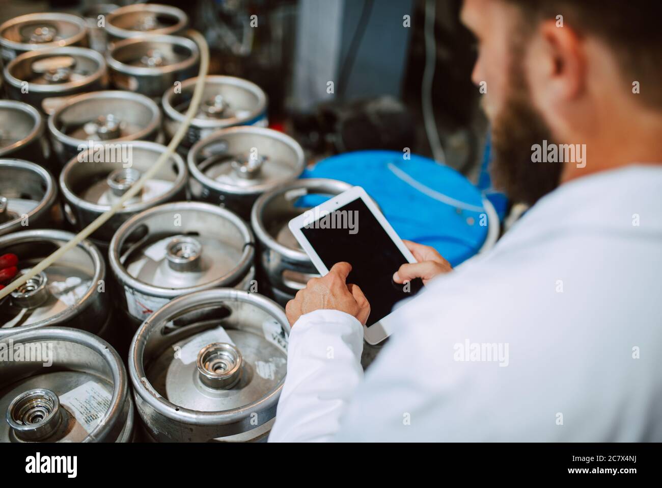 Closeup of tablet computer in hand of professional caucasian ...