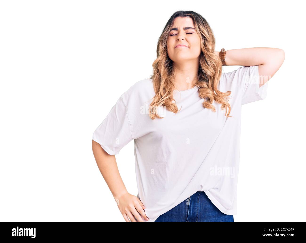 Young caucasian woman wearing casual clothes suffering of neck ache ...