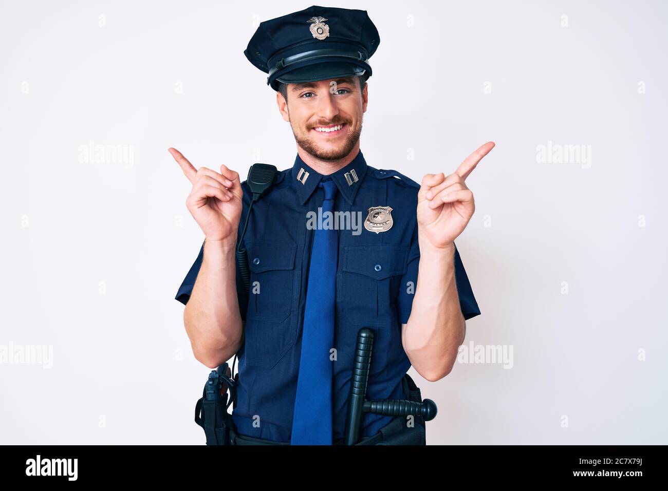 Police officer showing directions hi-res stock photography and images ...