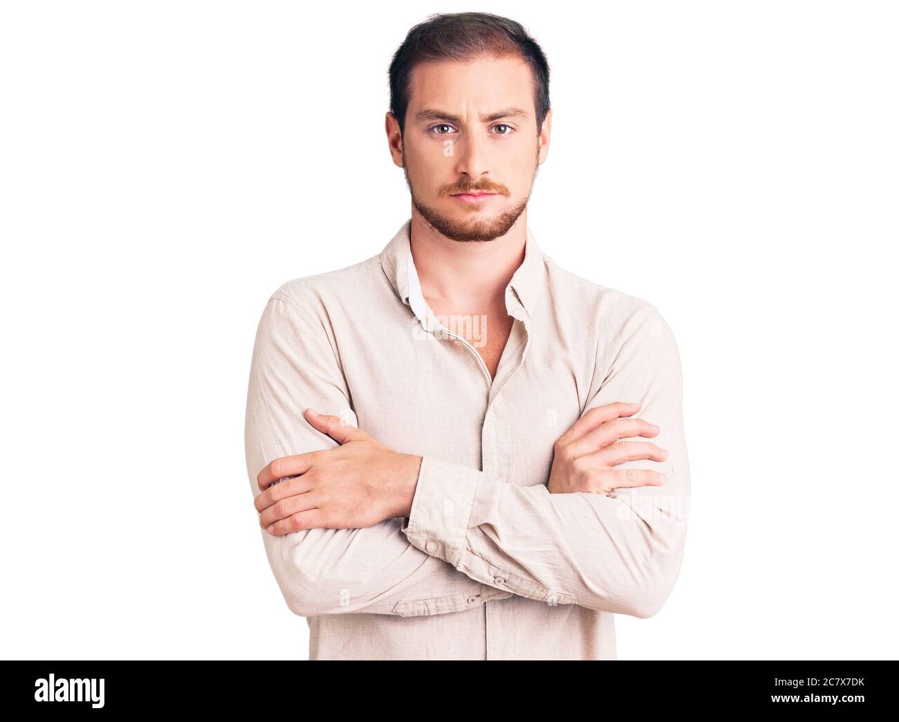 Young handsome caucasian man wearing casual clothes skeptic and nervous ...