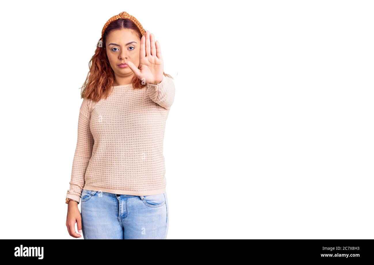 Young latin woman serious Cut Out Stock Images & Pictures - Alamy