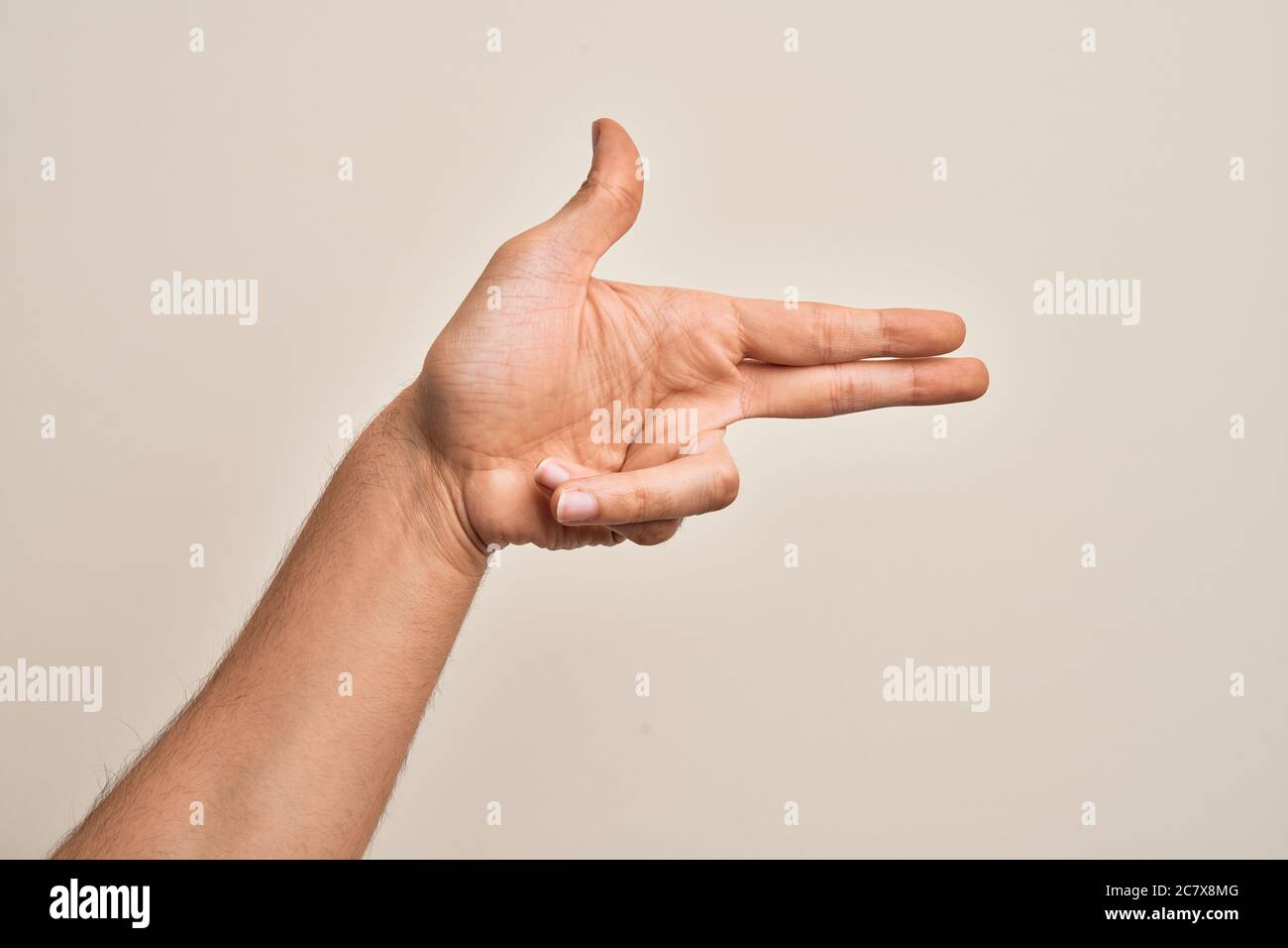 Hand of caucasian young man showing fingers over isolated white ...