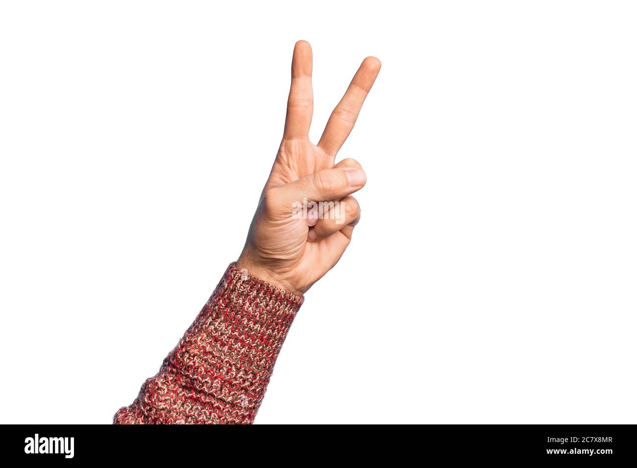Hand of caucasian young man showing fingers over isolated white background counting number 2 ...