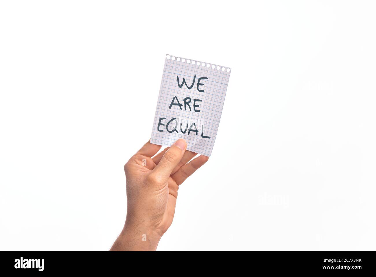 Cardboard banner WE ARE EQUAL, protesting for equal rights over ...