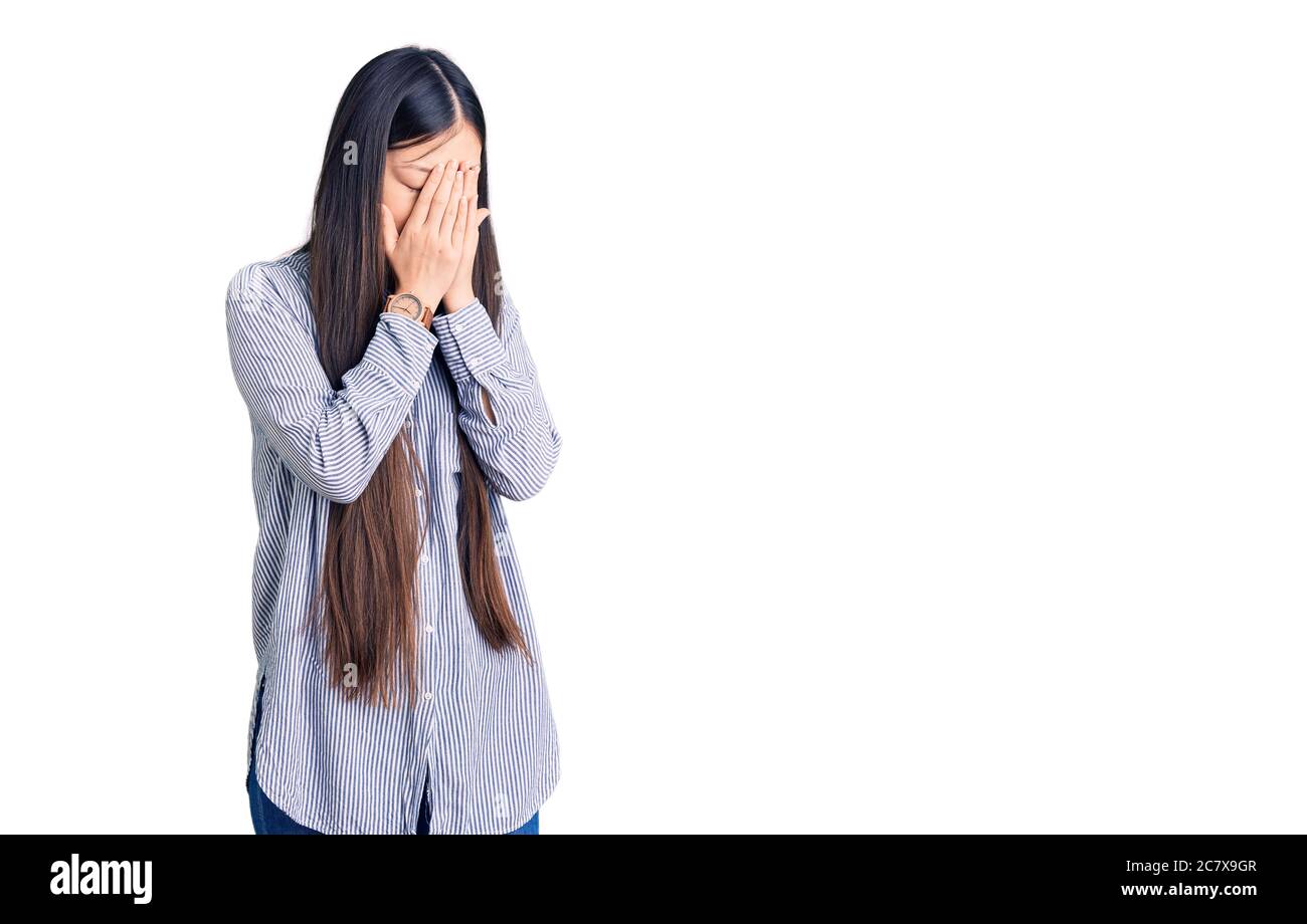 Hands covering face crying female Cut Out Stock Images & Pictures - Alamy