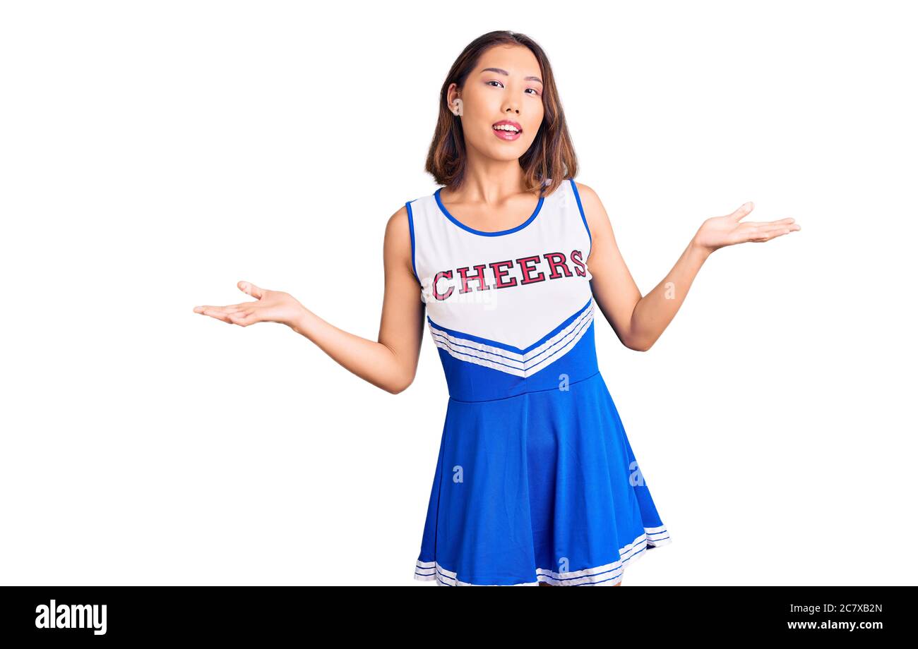 Young Beautiful Chinese Girl Wearing Cheerleader Uniform Smiling 8439