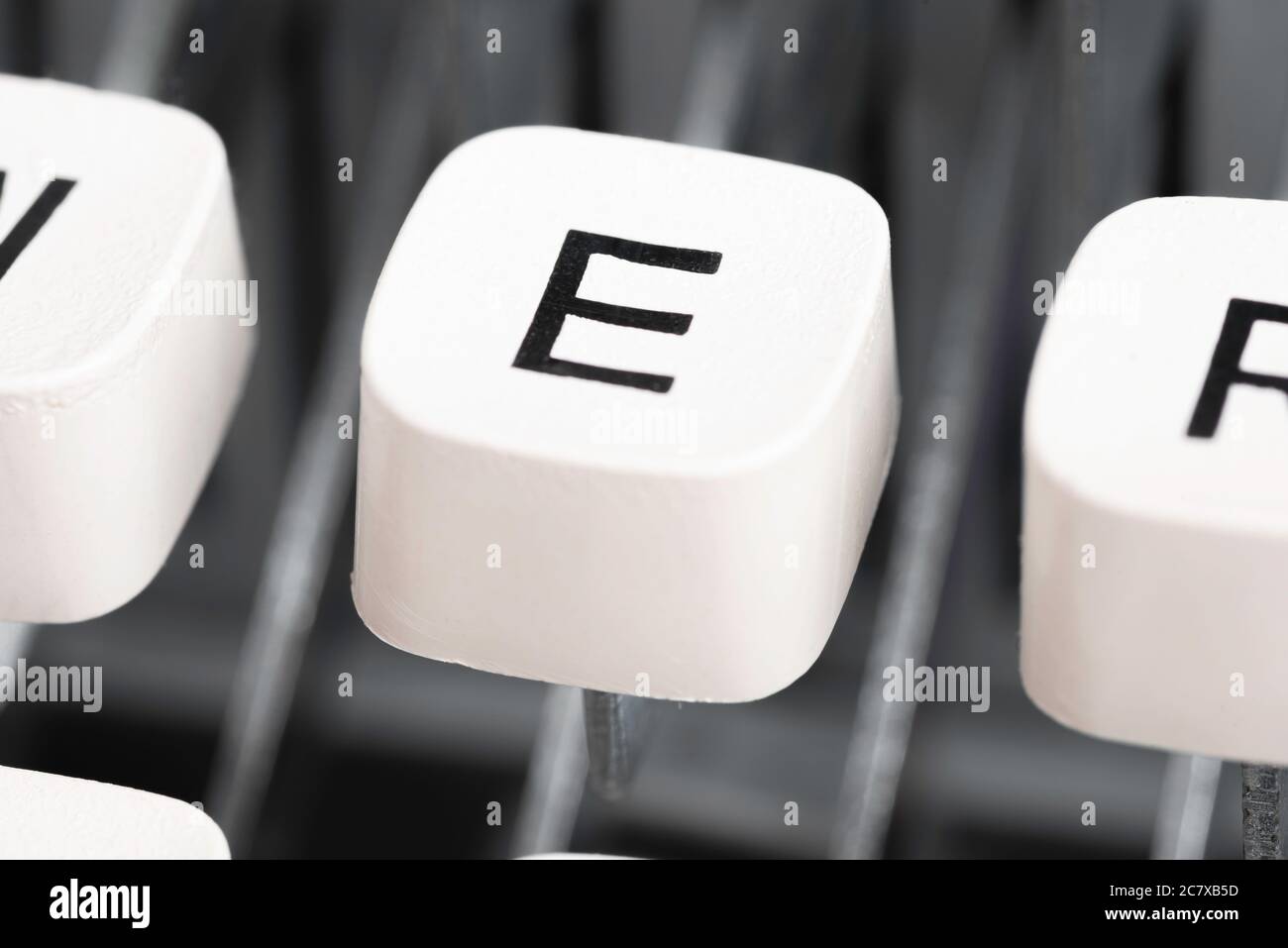 An extreme close-up or macro shot of a plastic keyboard key cap from a ...
