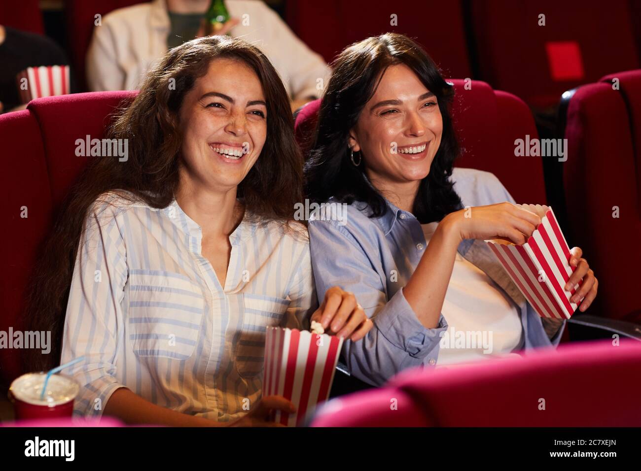 Man cinema laughing popcorn hi-res stock photography and images - Alamy