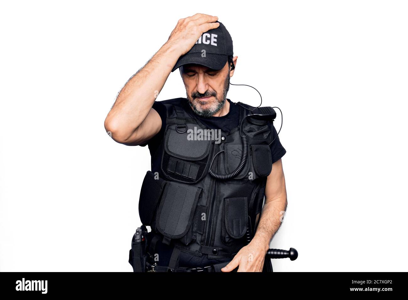 Middle age policeman wearing police uniform and bulletproof vest over ...