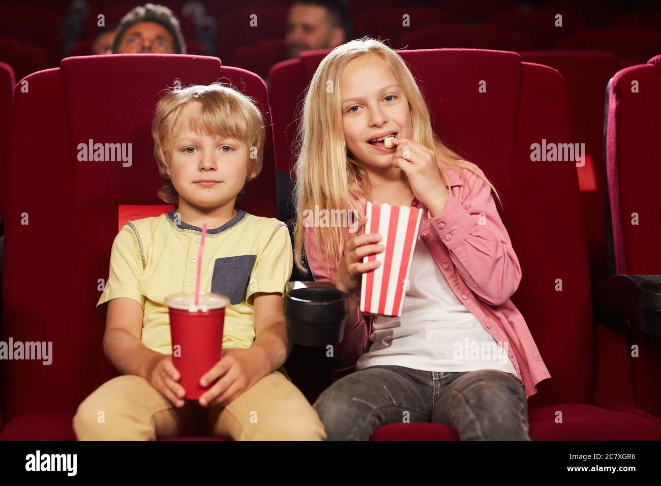 Kids watching movie theater hi-res stock photography and images - Alamy
