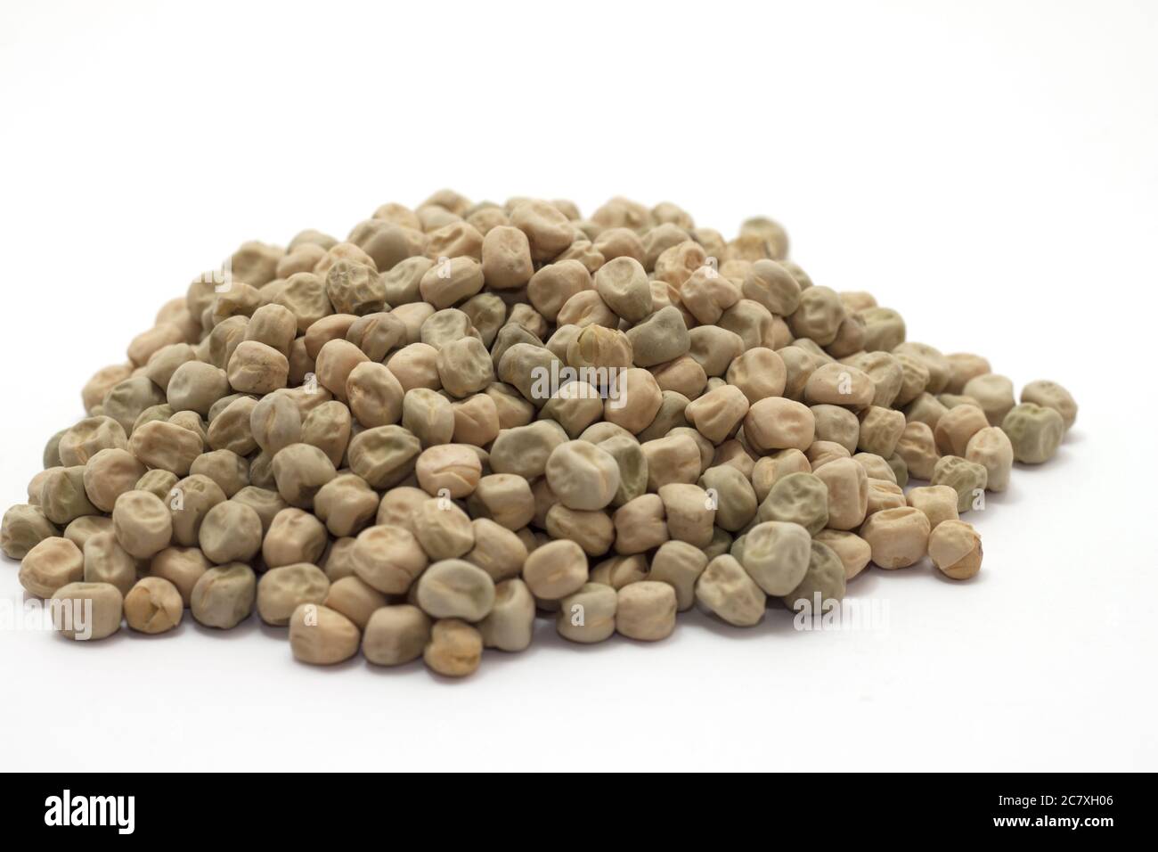 Closeup shot of pea seeds in a pile isolated on a white background ...
