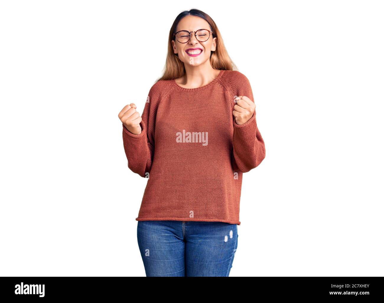 Beautiful young woman wearing casual clothes and glasses excited for ...