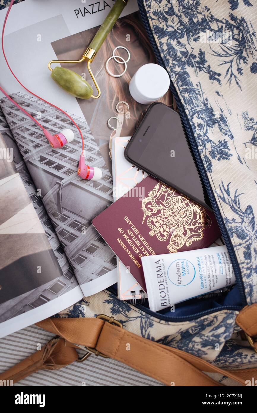 Close up shot of traveling essentials in an aesthetic setting Stock ...