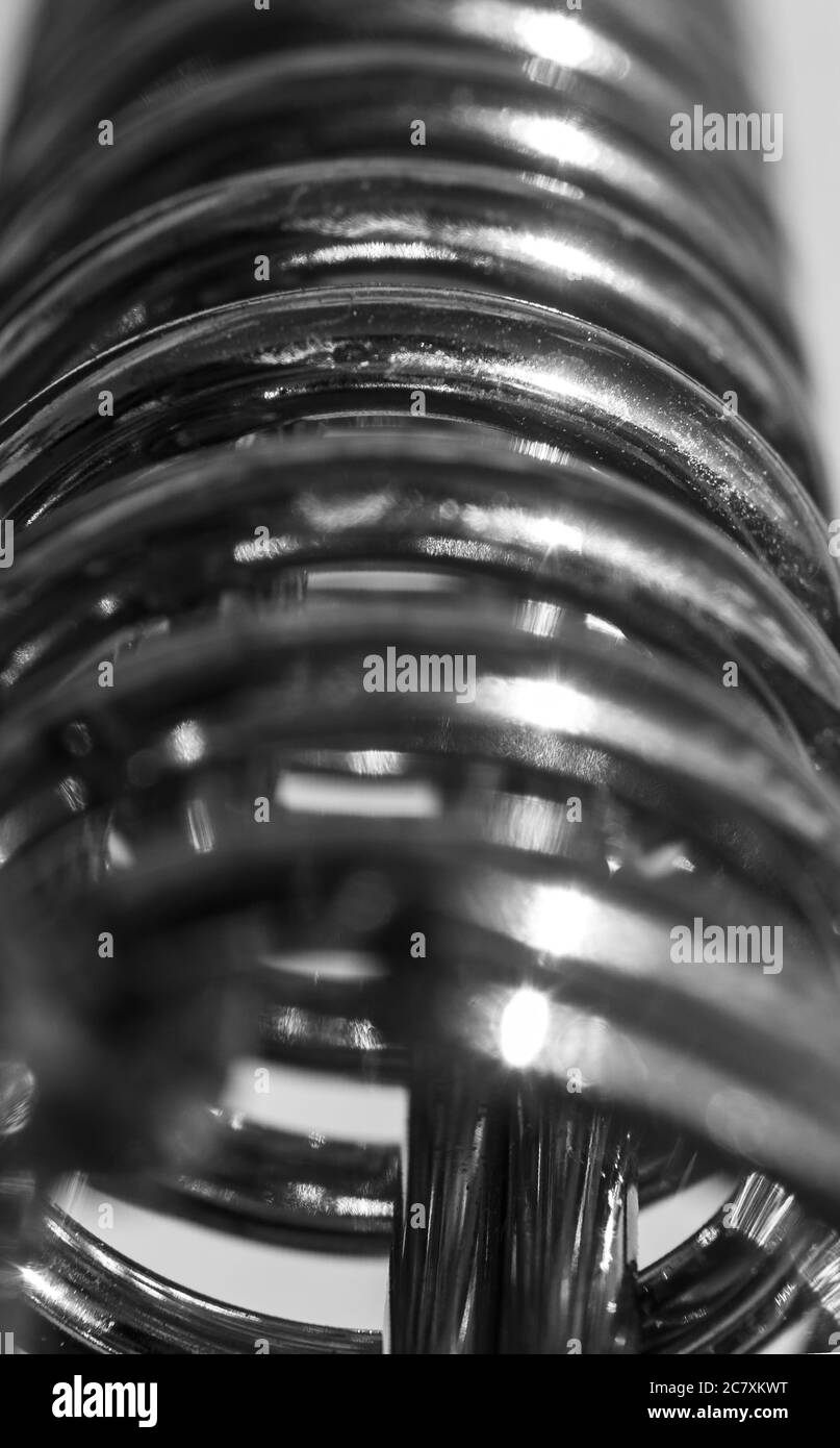 Vertical closeup of a steel spiral Stock Photo - Alamy