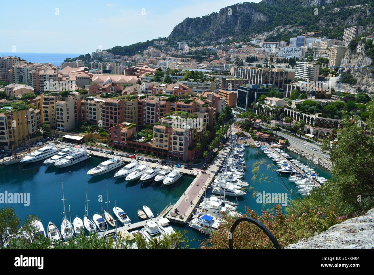 Yacht docks and mountains in Monaco harbour Stock Photo - Alamy