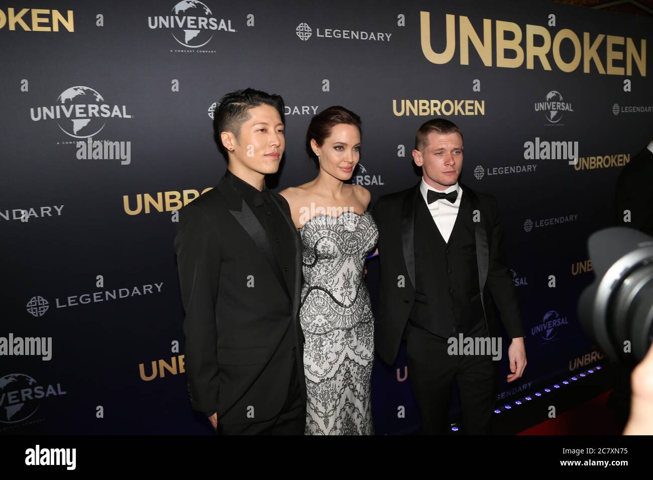 Unbroken producer and director Angelina Jolie with actors Miyavi and ...