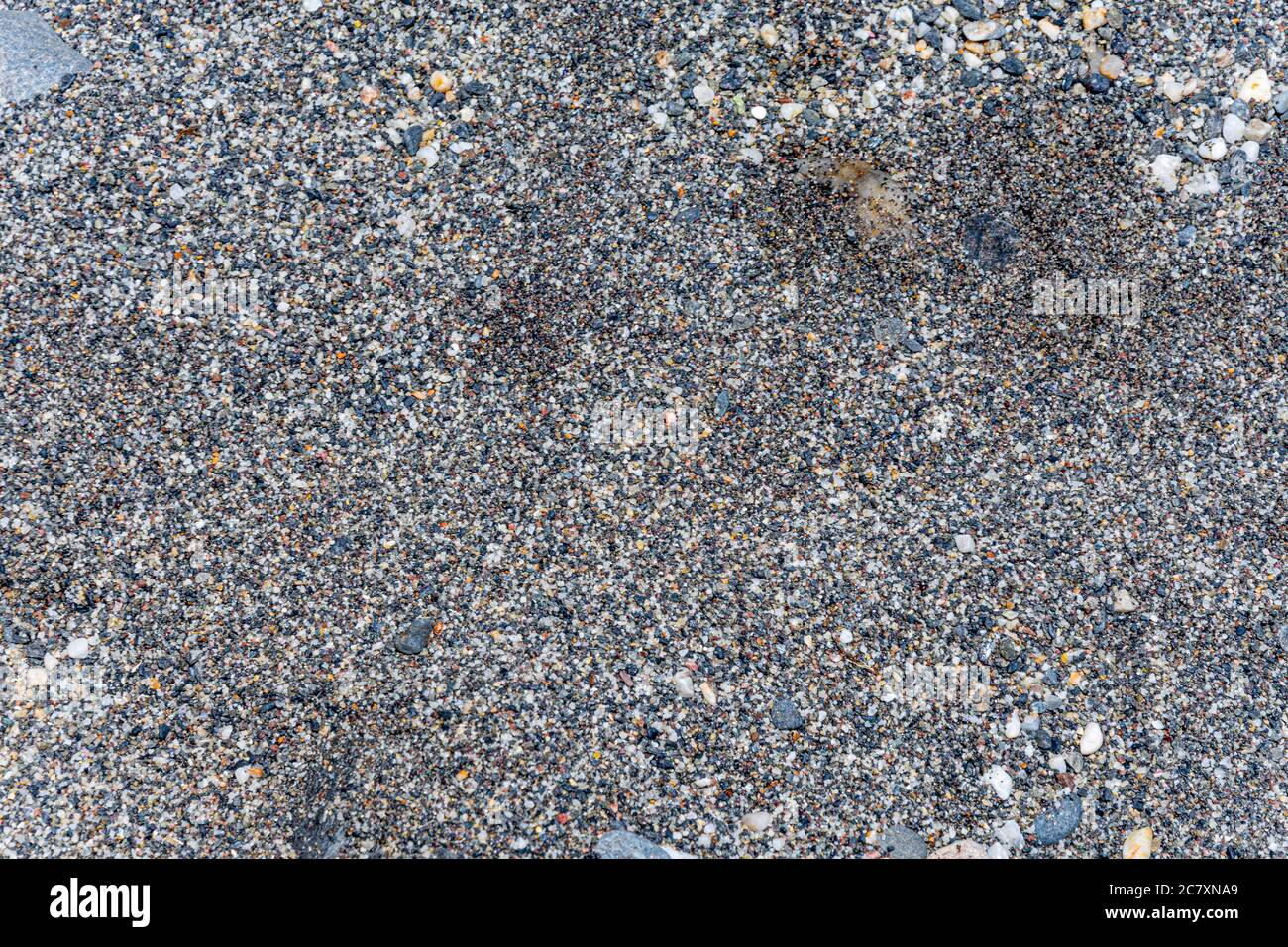 Overhead shot of sea sand under the sunlight Stock Photo - Alamy
