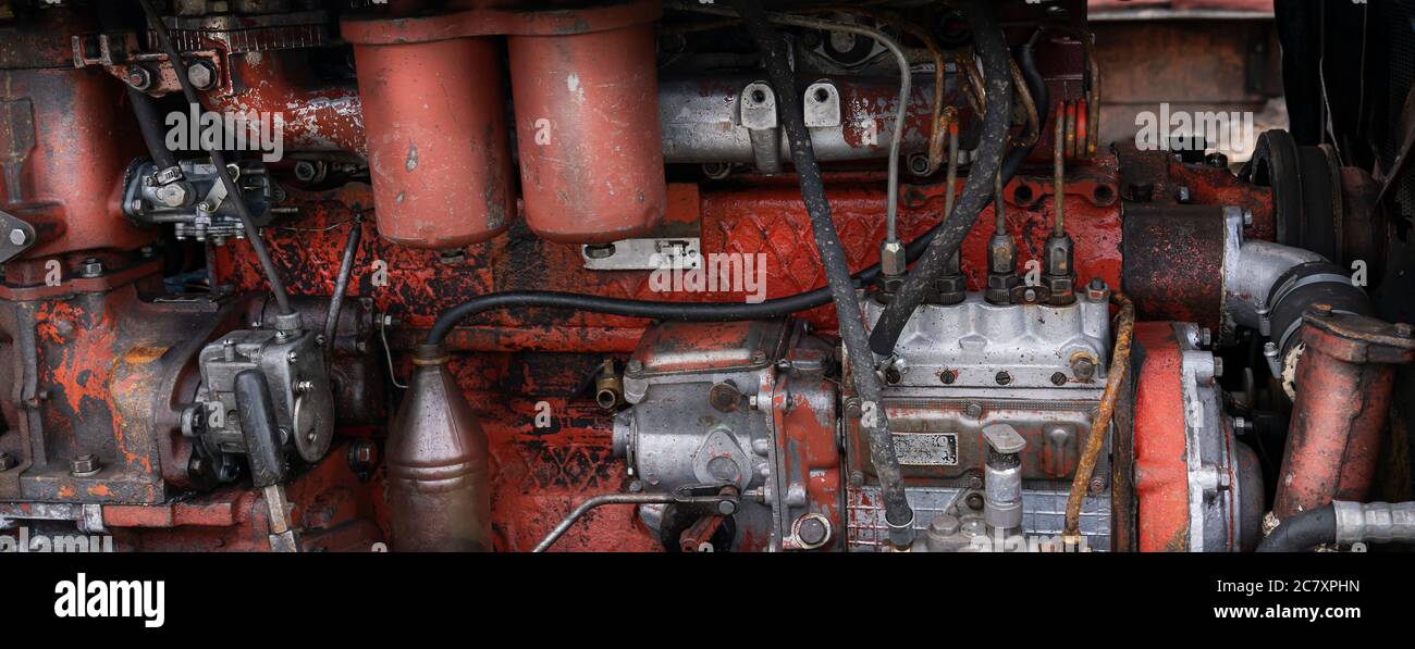 old diesel tractor engine close-up panorama, red and rusty Stock Photo ...