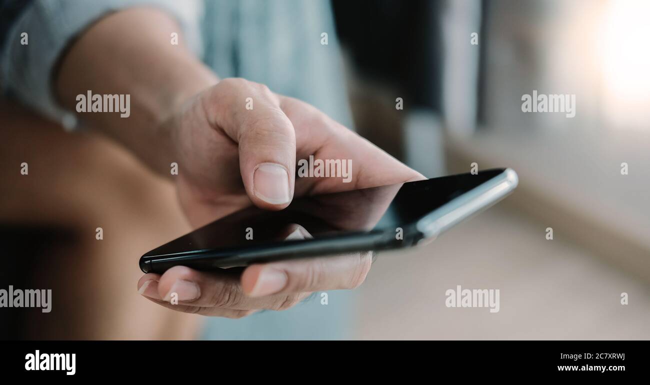 Close up man using phone hi-res stock photography and images - Alamy