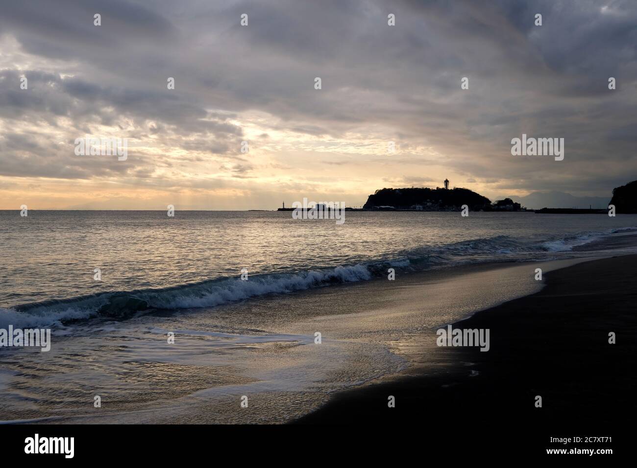 Beautiful sunset of Enoshima island in Kanagawa Japan. Sea waves ...