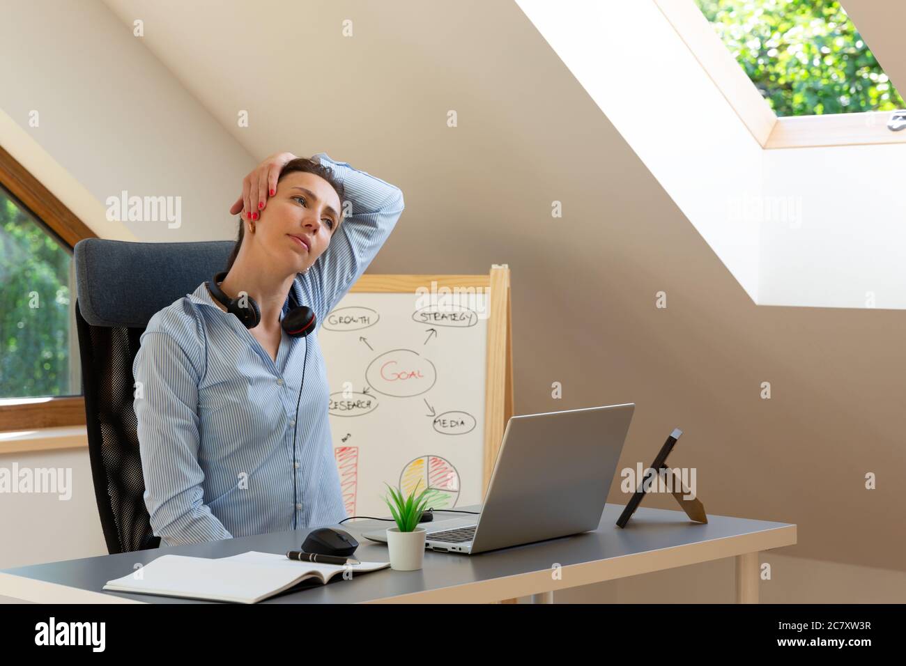 Beautiful women performing exercises and stretching in front of a ...