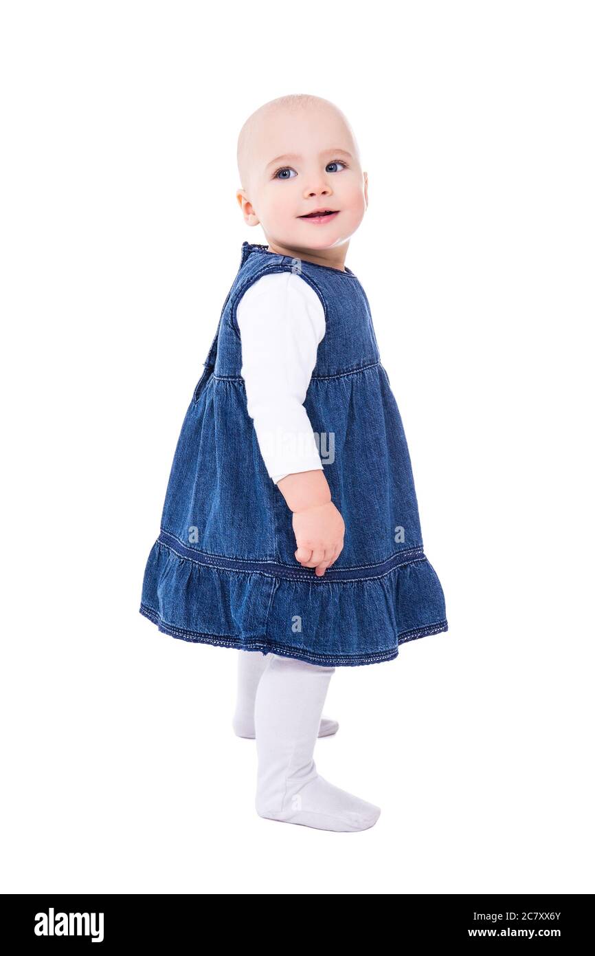 side view of cute baby girl standing isolated on white background Stock ...