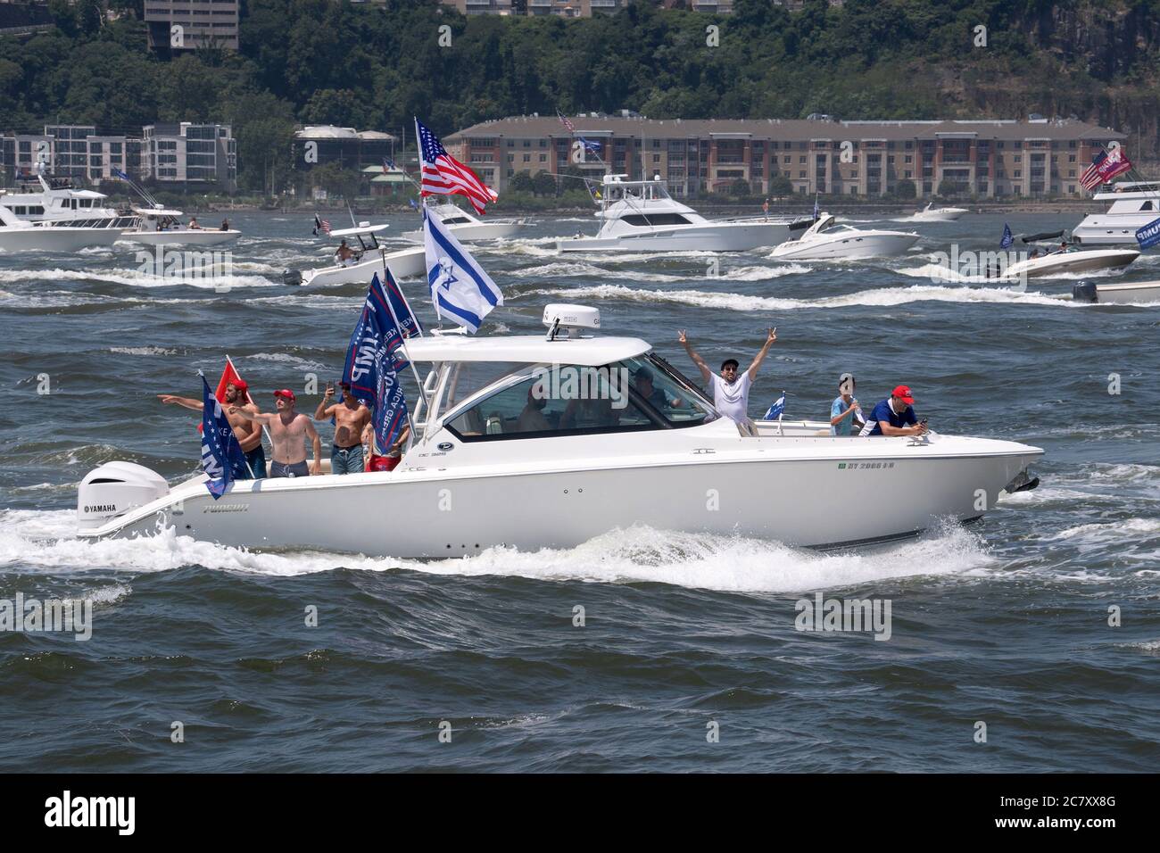 NEW YORK, NY - JULY 19. 2020: A huge flotilla of boats and jetski ...