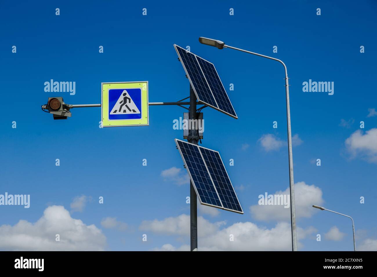 The pedestrian crossing sign powered by solar panels installed above ...