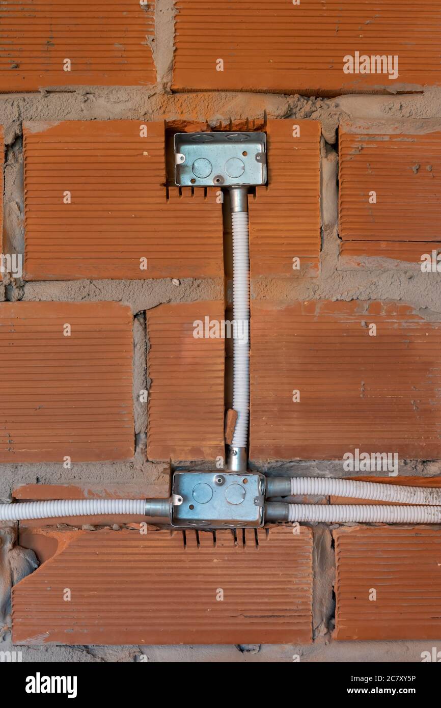 Electrical socket arrangement on a wall in a construction site Stock ...