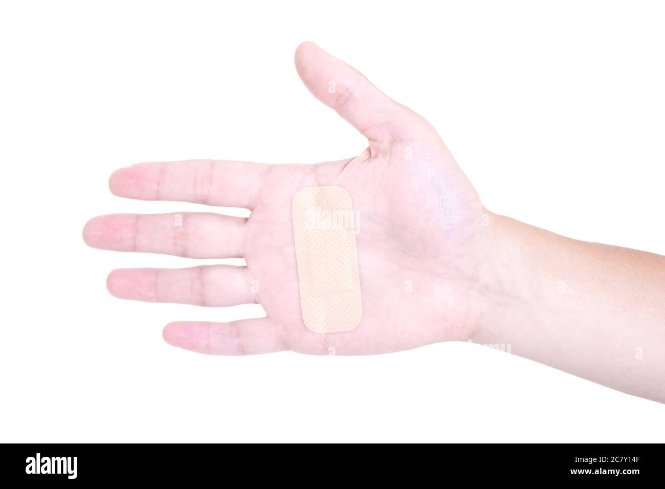 close up of male palm with adhesive plaster isolated on white ...