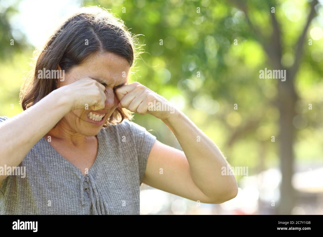 Adult woman feeling itch scratching hi-res stock photography and images ...
