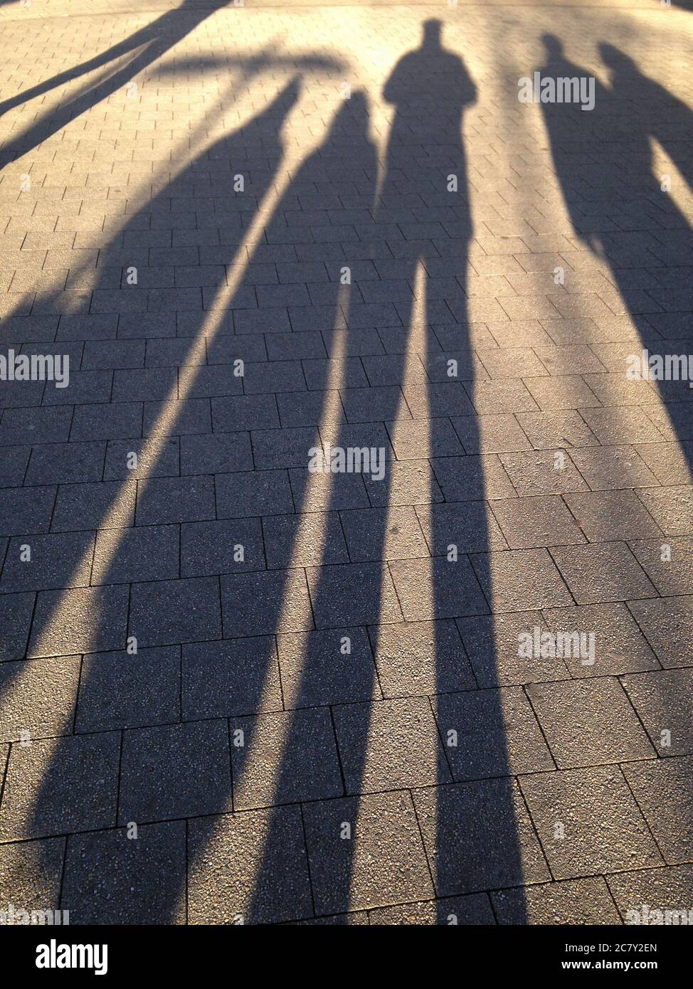 Human shadows on the ground hi-res stock photography and images - Alamy