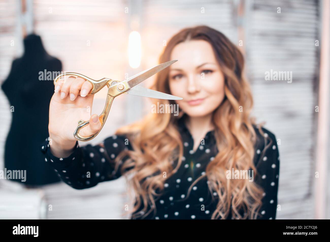 Portrait female tailor holding scissors hi-res stock photography and ...