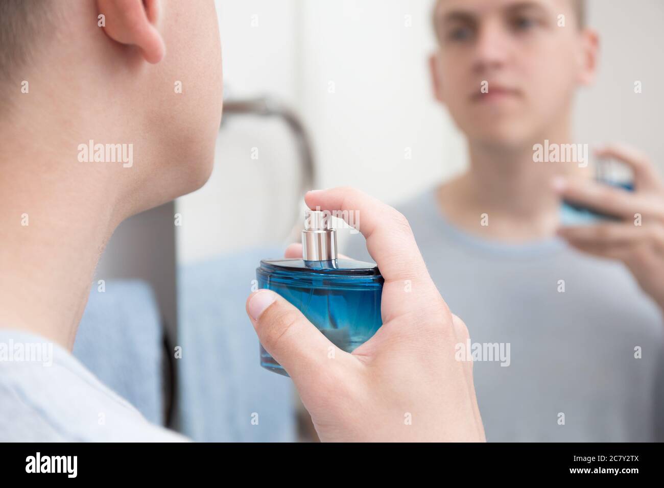 Man applying cologne hi-res stock photography and images - Alamy