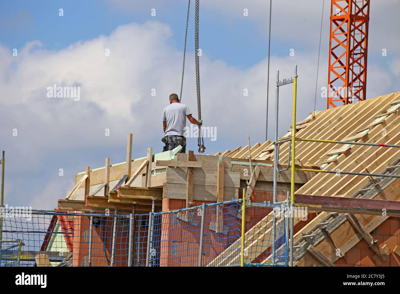 Construction worker (bricklayer) works on the construction site Stock ...