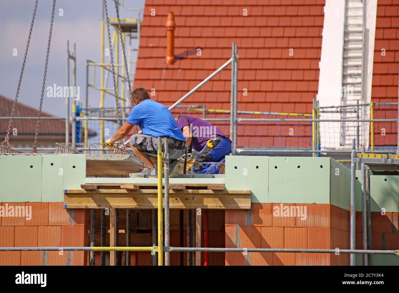 Construction worker (bricklayer) works on the construction site Stock ...
