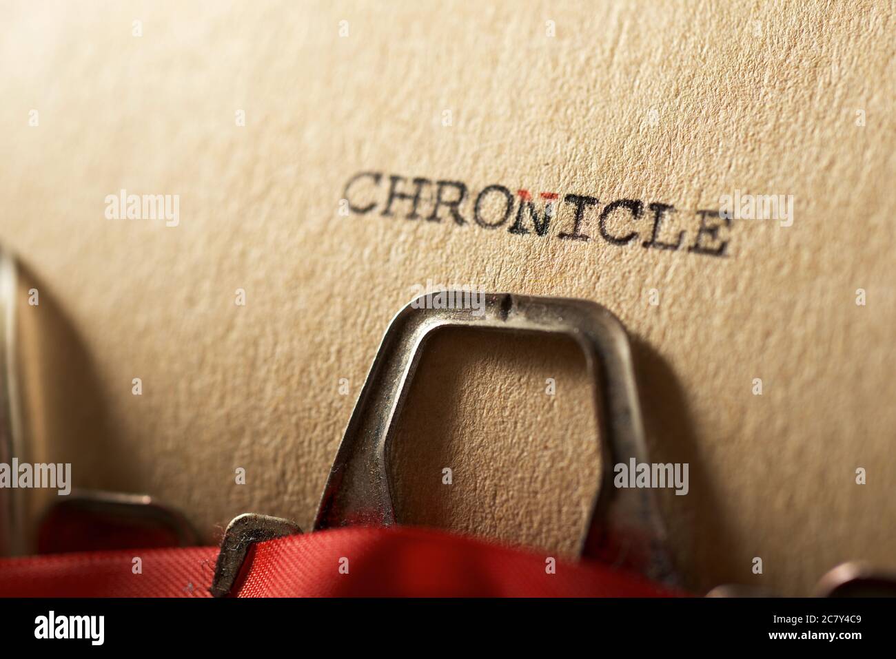 Chronicle word written with a typewriter Stock Photo - Alamy
