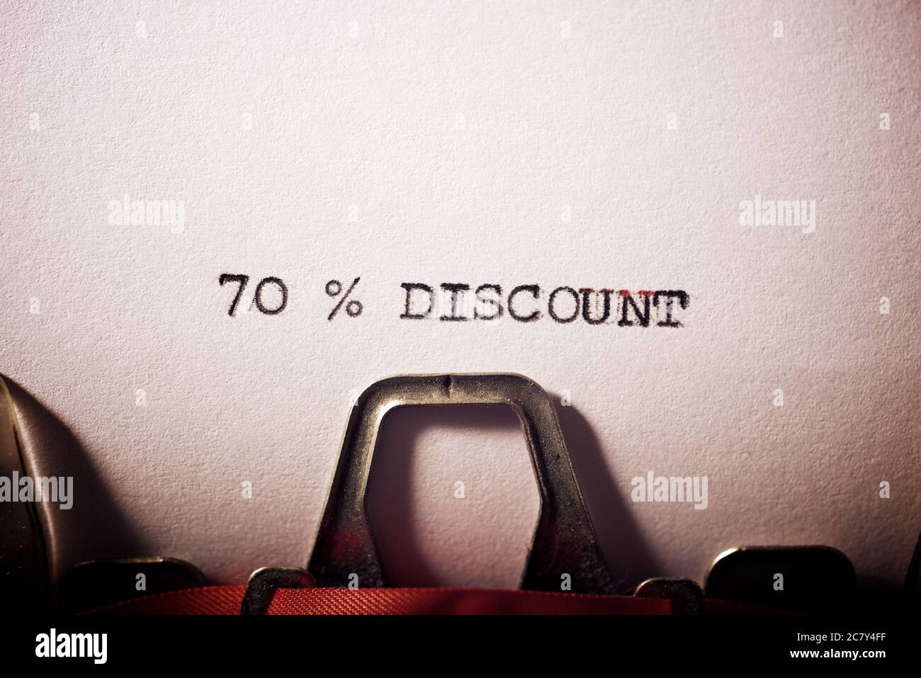 70 % discount text written on a paper Stock Photo - Alamy