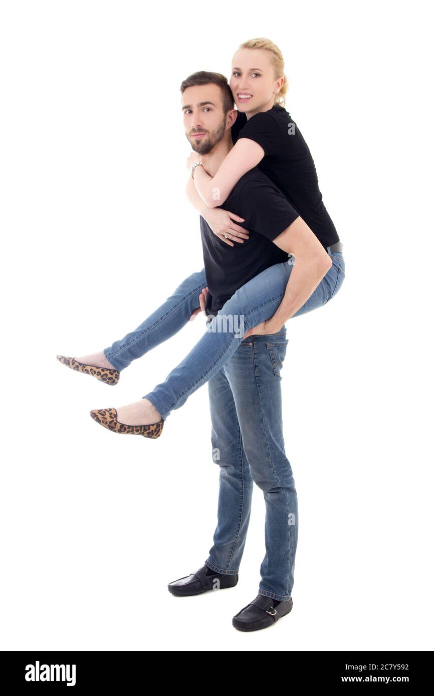 happy young man holding his girlfriend isolated on white background ...