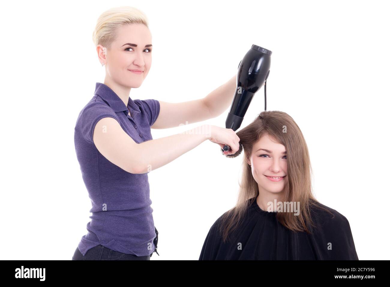 happy woman hairdresser doing haircut to client isolated on white ...