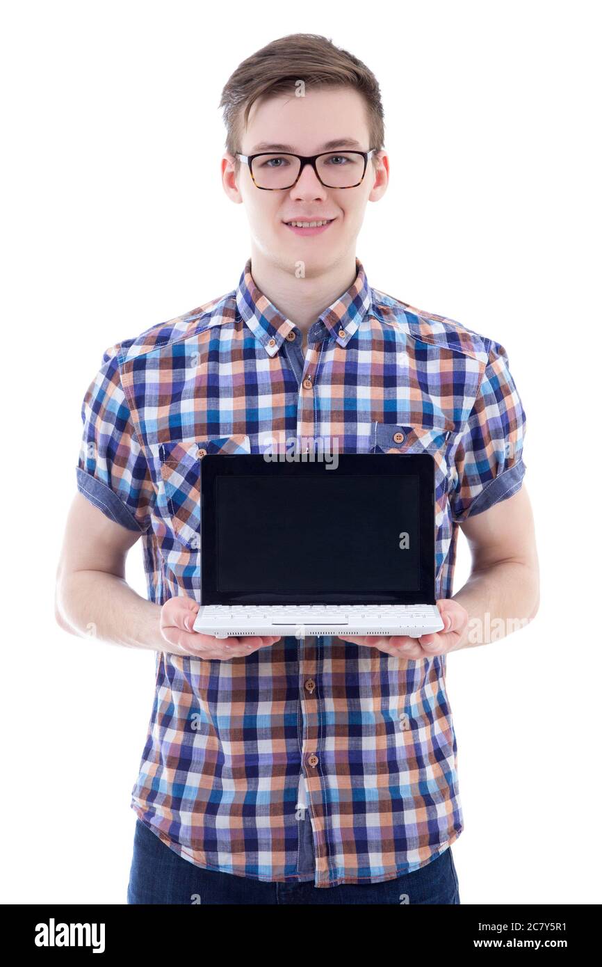 portrait of handsome teenage boy holding laptop with blank screen ...
